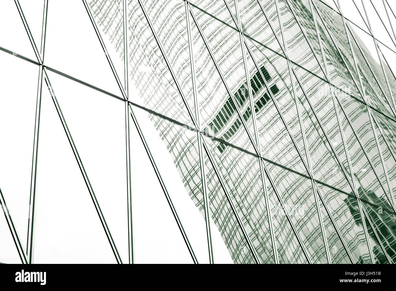Modern office building detail, glass surface with green color Stock ...