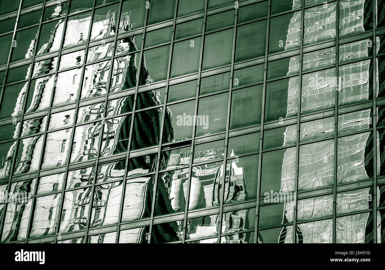 Modern office building detail, glass surface with green color Stock ...
