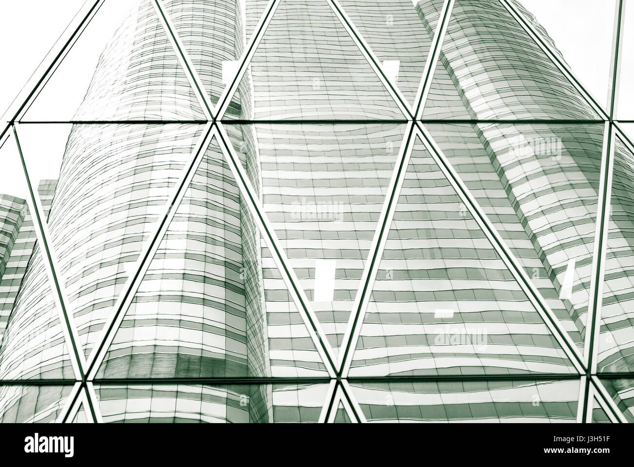 Modern office building detail, glass surface with green color Stock ...