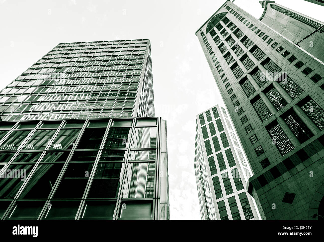 Modern office building detail, glass surface with green color Stock ...