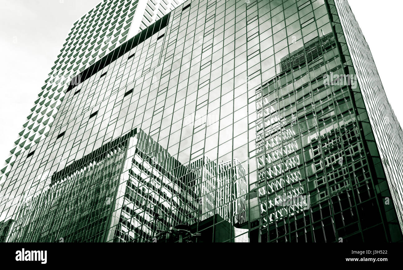 Modern office building detail, glass surface with green color Stock ...