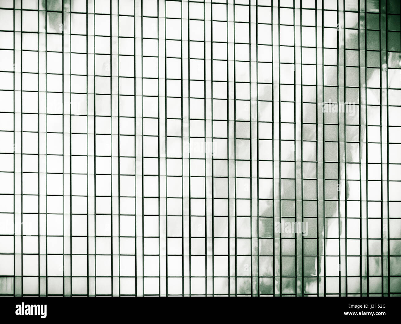 Modern office building detail, glass surface with green color Stock ...