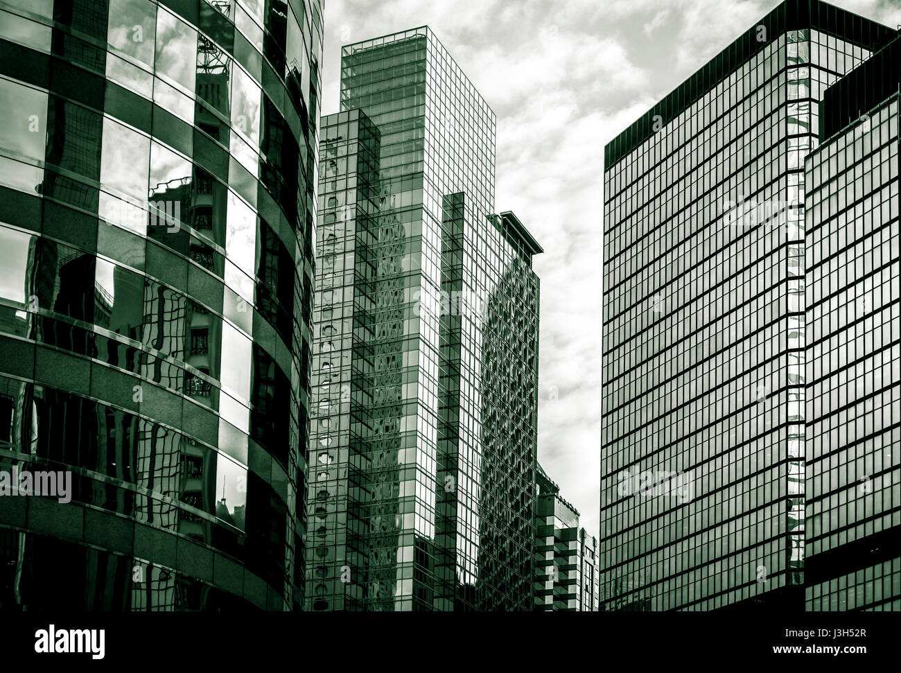 Modern office building detail, glass surface with green color Stock ...