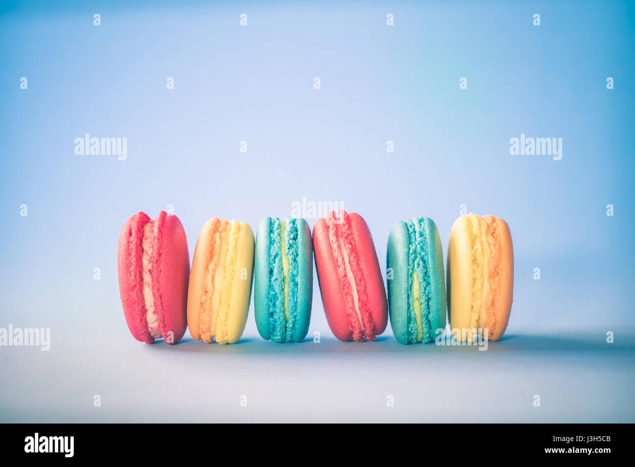 Assorted colorful french cookies macaroons, Almond cookies with pastel ...