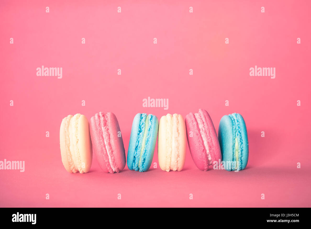 Assorted colorful french cookies macaroons, Almond cookies with pastel ...