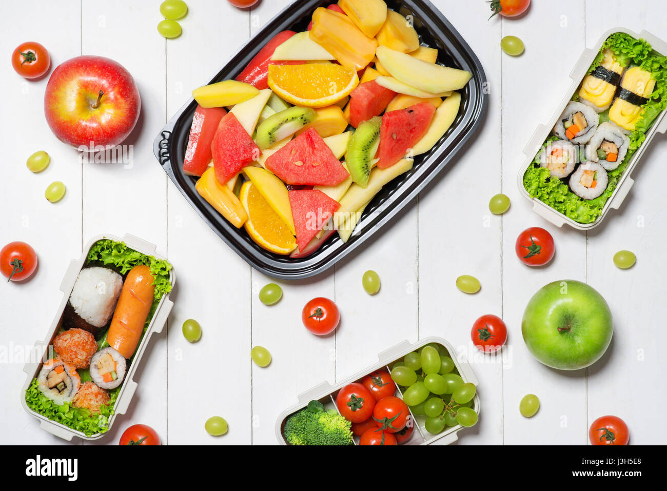 Healthy food concept. Bento box with food, fresh veggies and fruits ...
