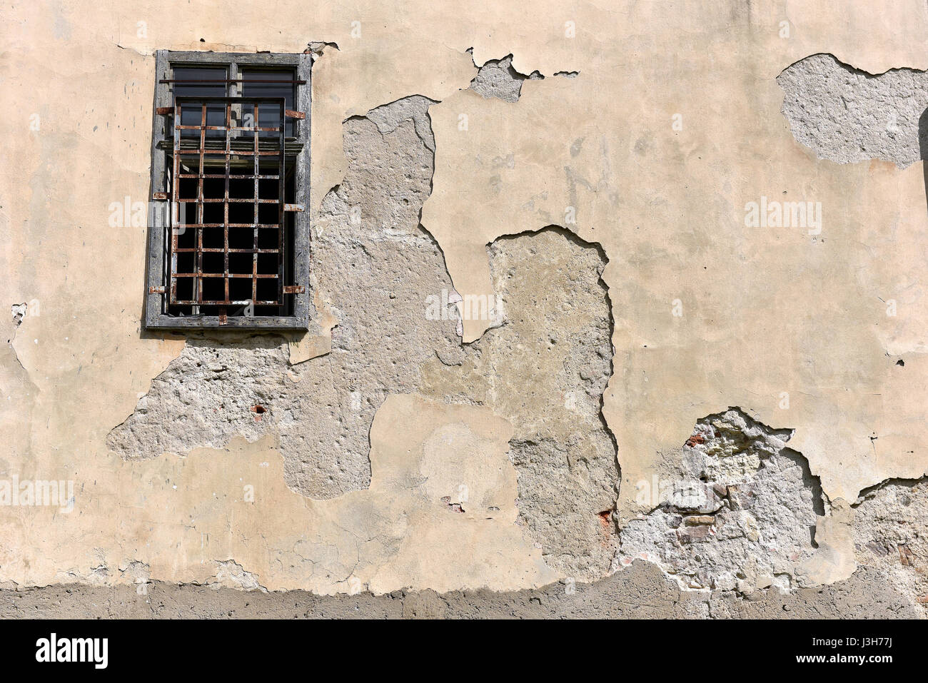 Old abandoned building wall texture with locked windows Stock Photo - Alamy