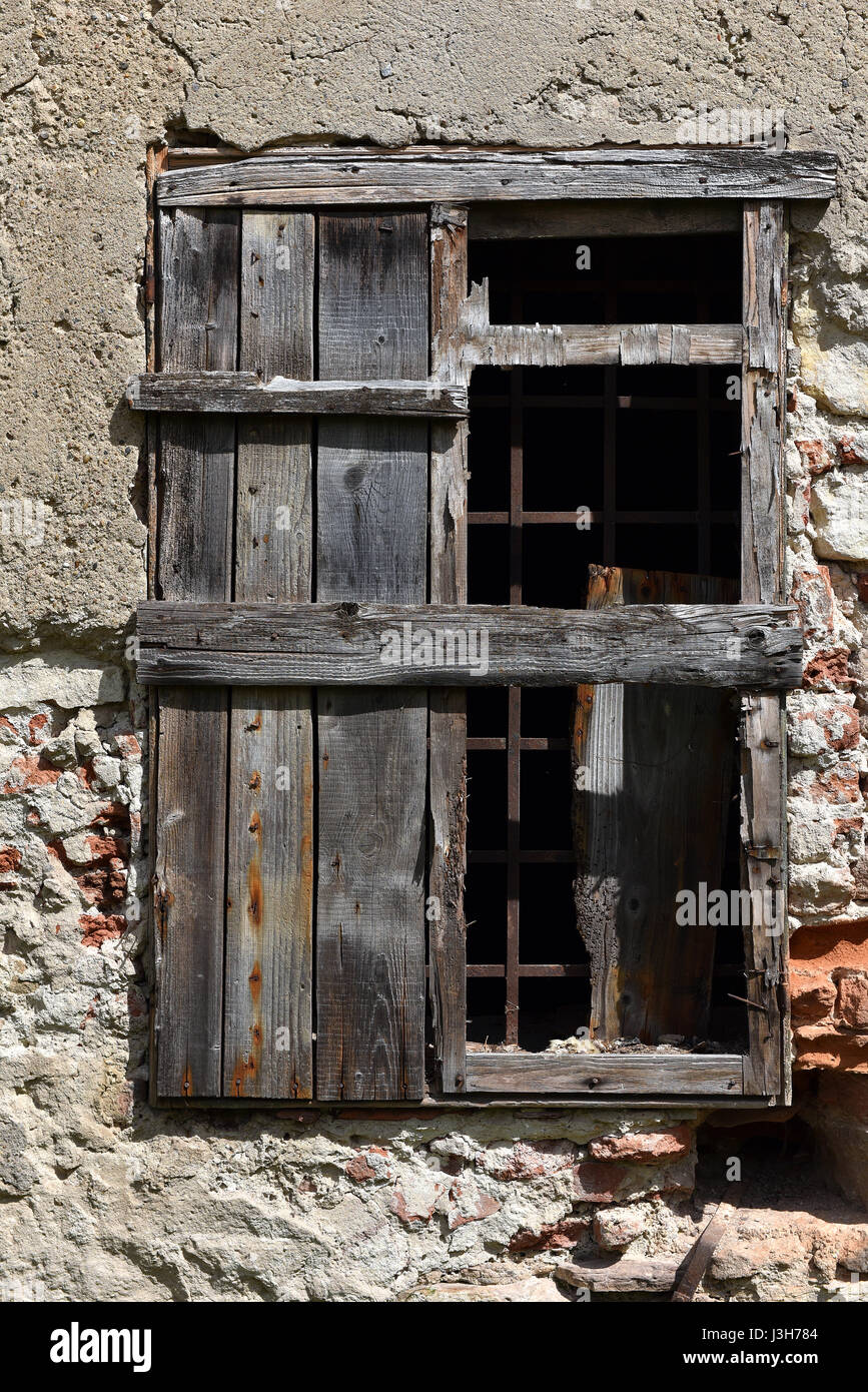 Old abandoned building wall texture with locked windows Stock Photo - Alamy