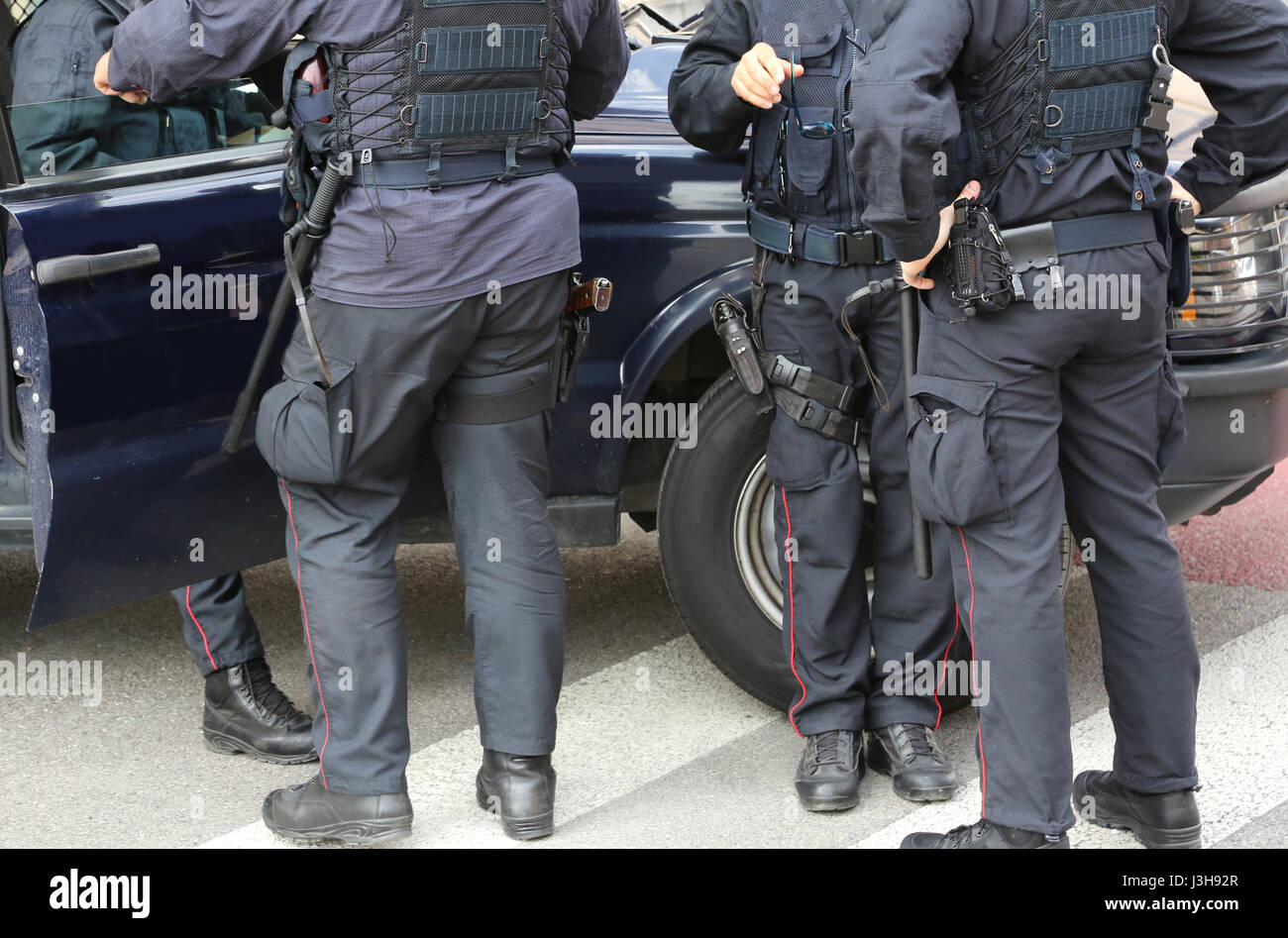 group of policeman in riot gear during a roadblock to control the ...