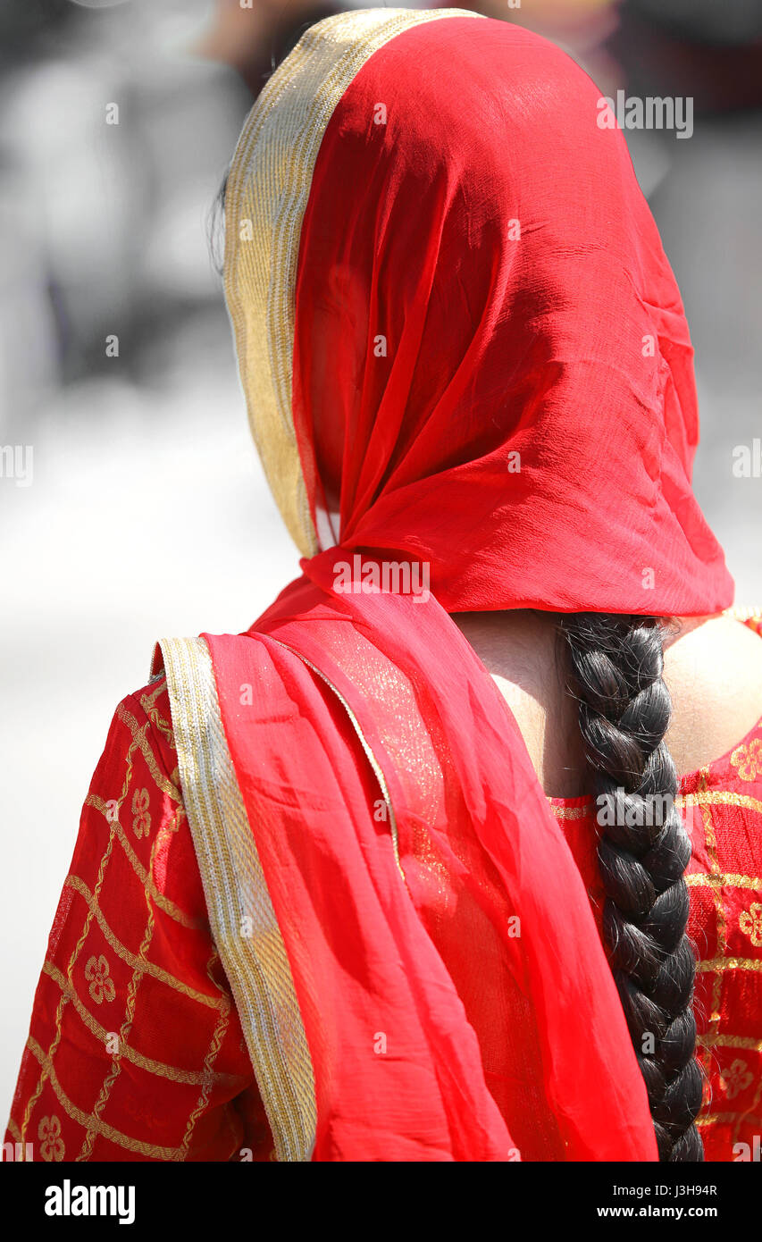 indian woman with long black hair and red veil Stock Photo - Alamy