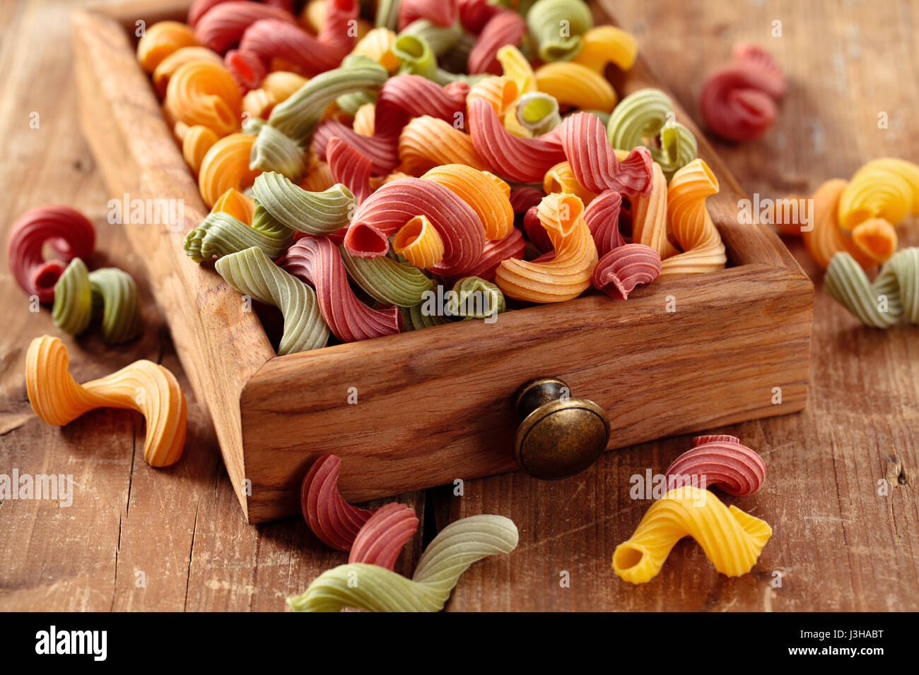 Colorful Italian pasta ‘Amore’ in small drawer Stock Photo - Alamy