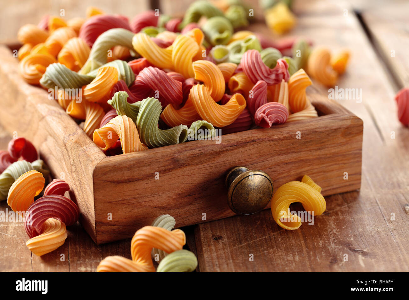 Colorful Italian pasta ‘Amore’ in small drawer Stock Photo - Alamy