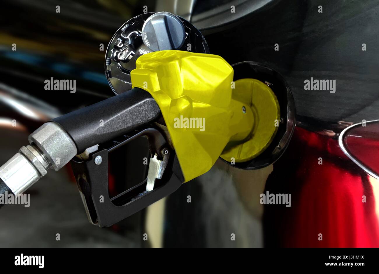 Black car fueling petrol at station Stock Photo - Alamy