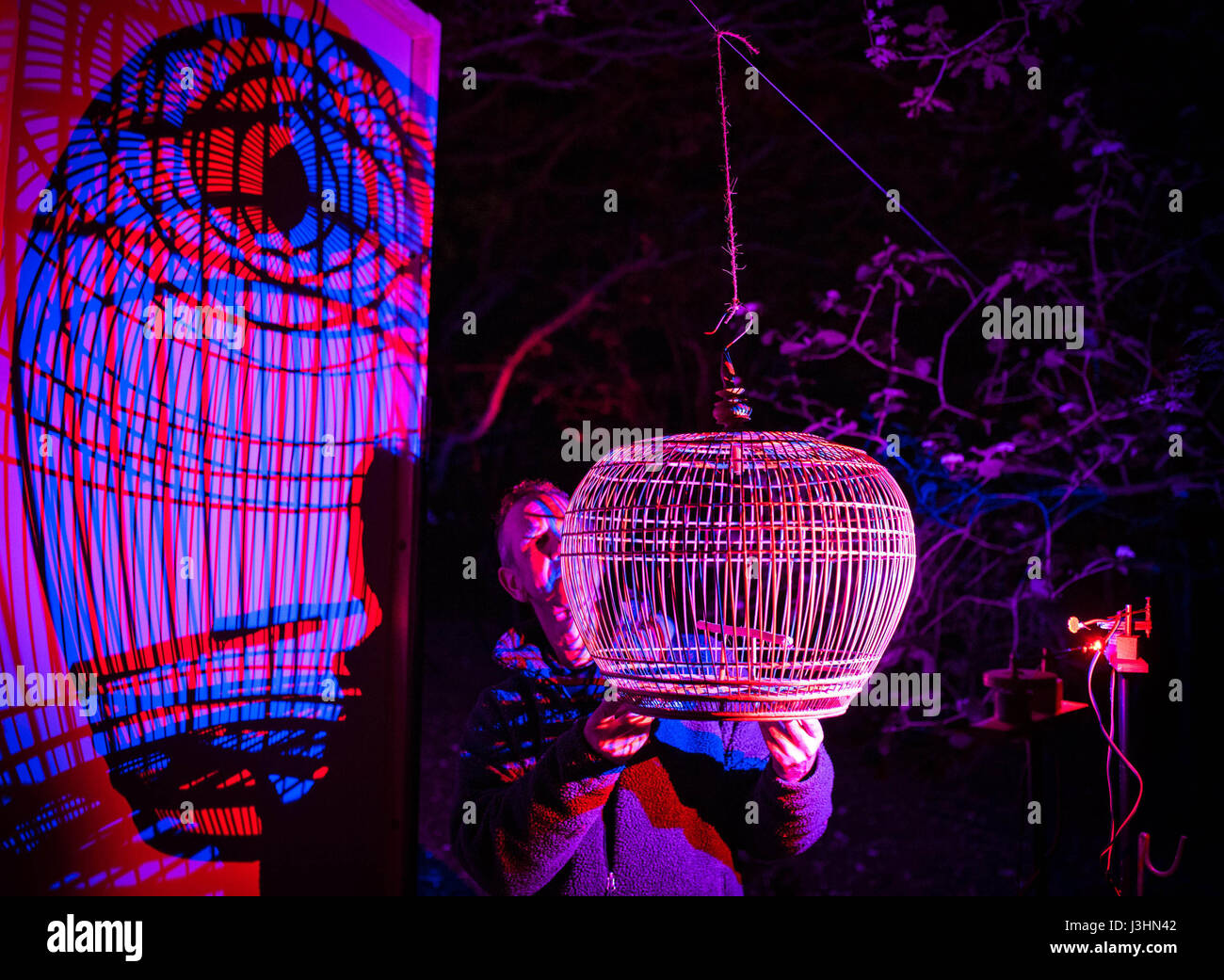 Artist Jony Easterby puts the finishing touches to his piece 'Cage ...