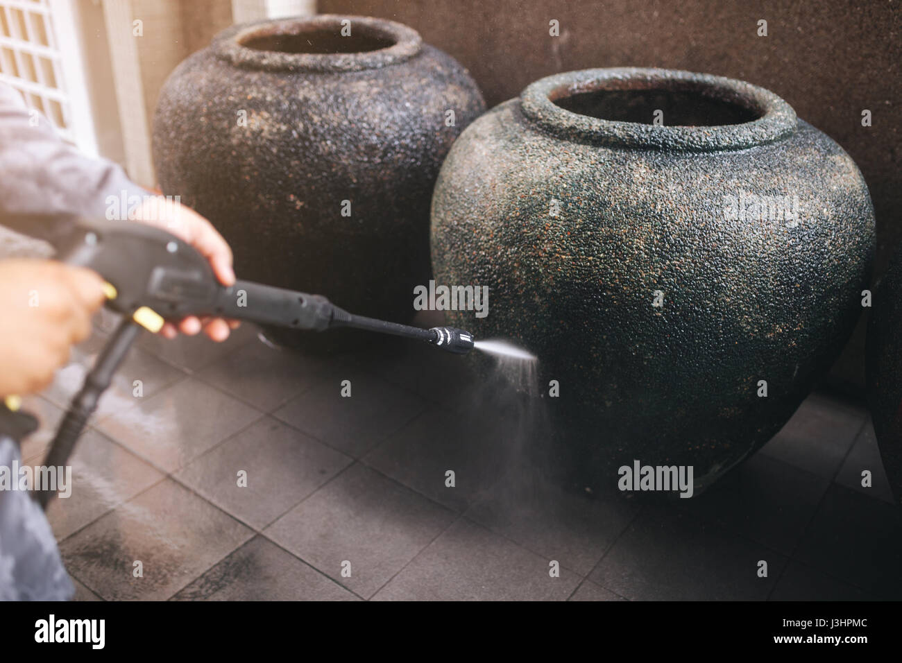 Object cleaning with high pressure water cleaner Stock Photo - Alamy