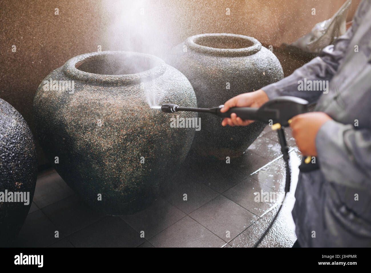 Object cleaning with high pressure water cleaner Stock Photo - Alamy