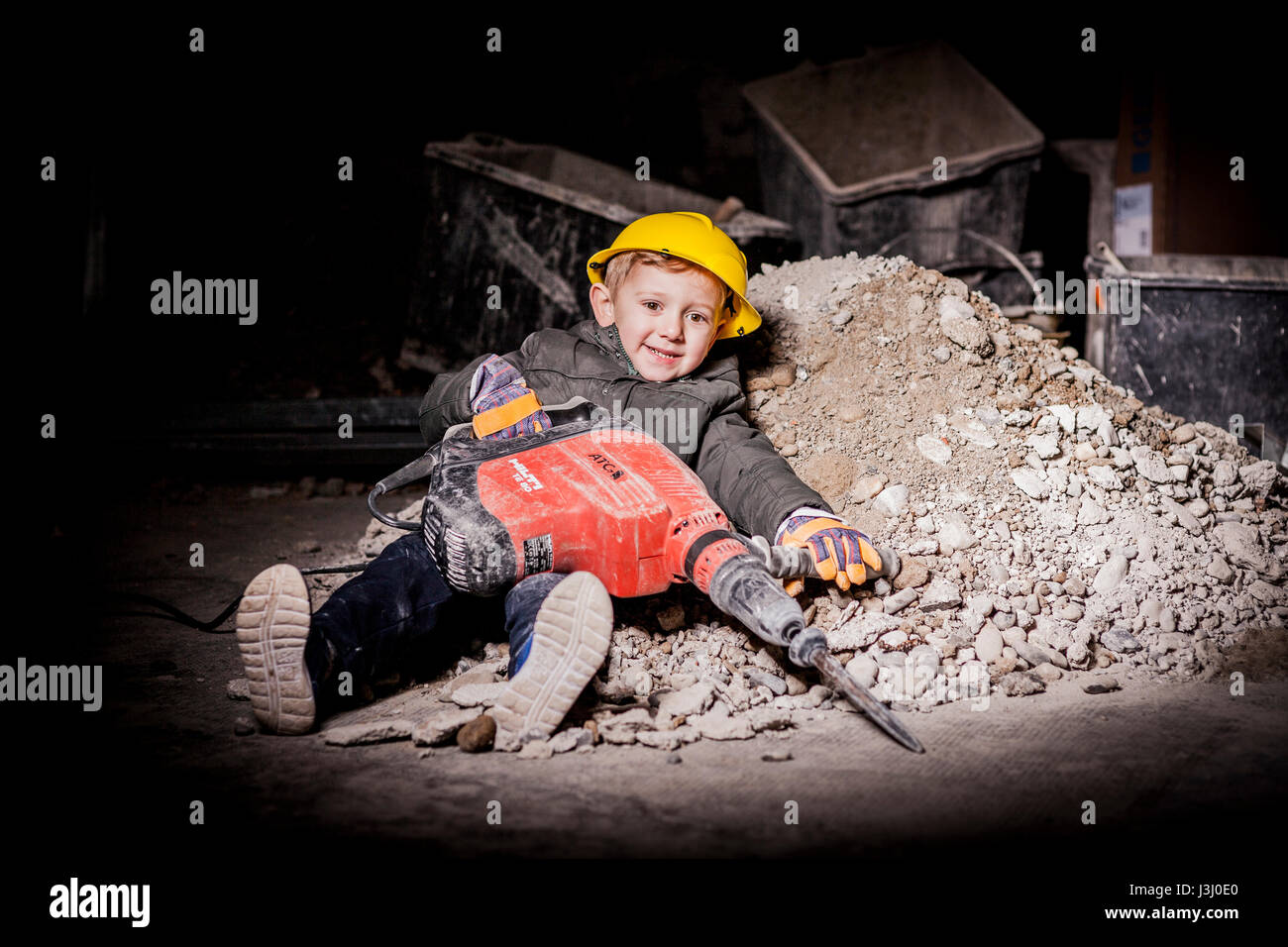 portrait of kid enjoy to act like real labor Stock Photo - Alamy
