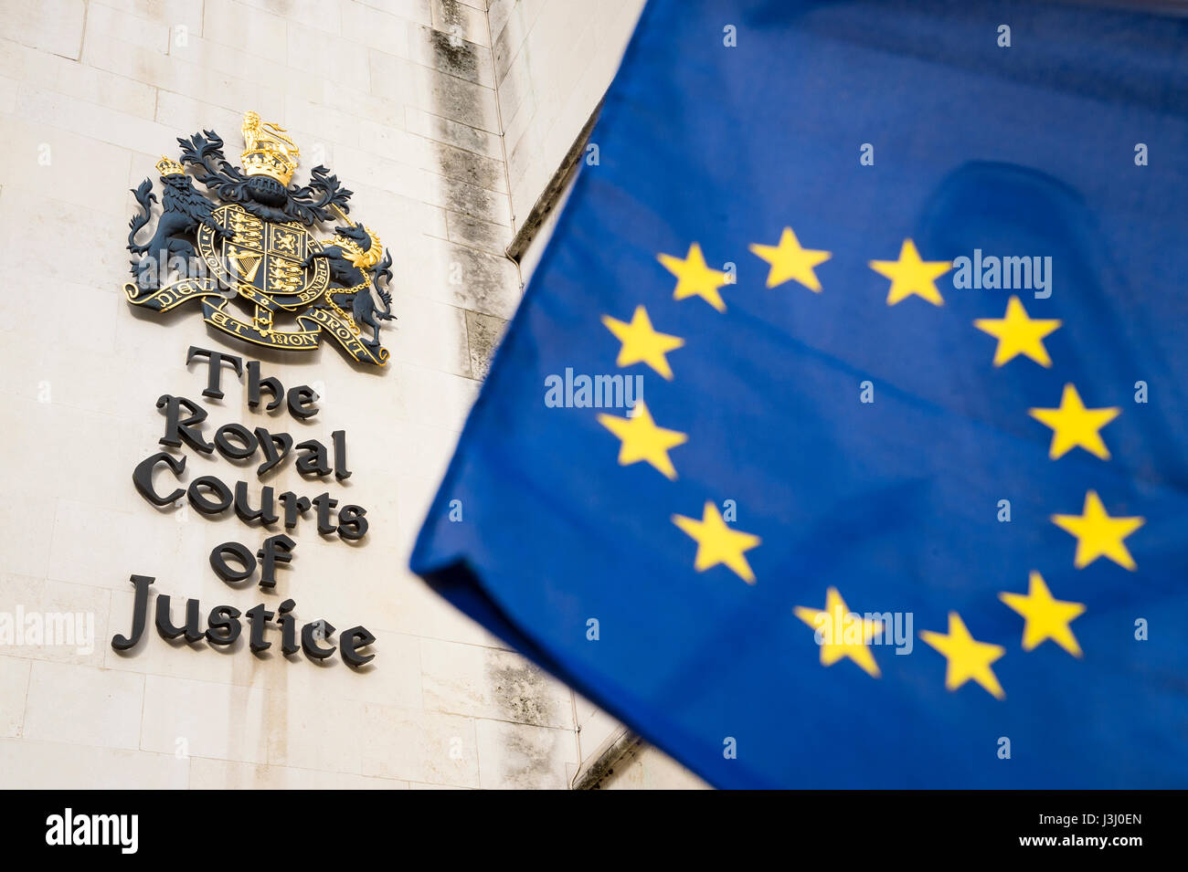 EU European Union flag flying in bright sun in front of the Royal ...
