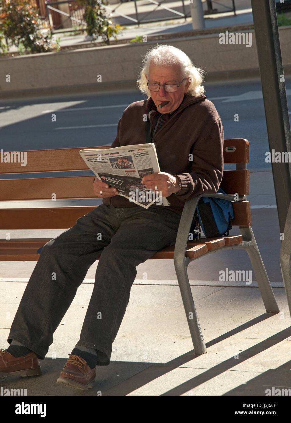 Smoking man sitting back hi-res stock photography and images - Alamy