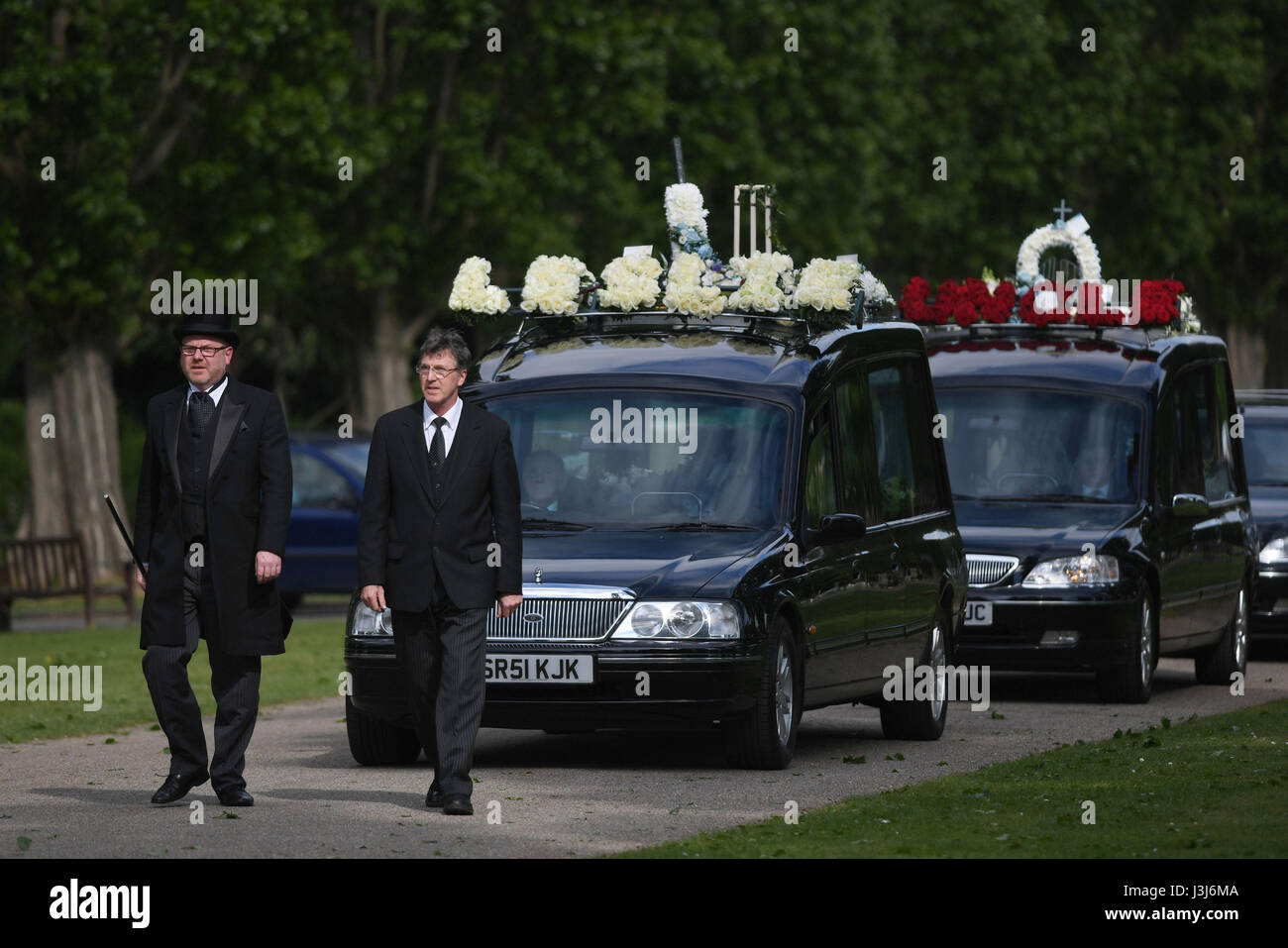 A hearse carrying the coffin of Leslie Rhodes, who died in the ...