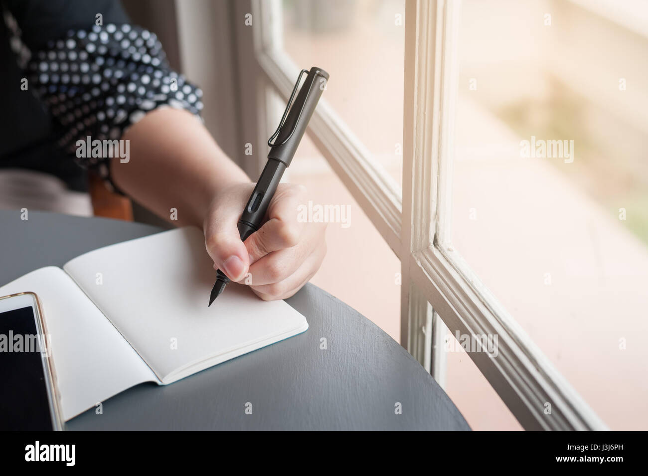 Left handed writing hi-res stock photography and images - Alamy