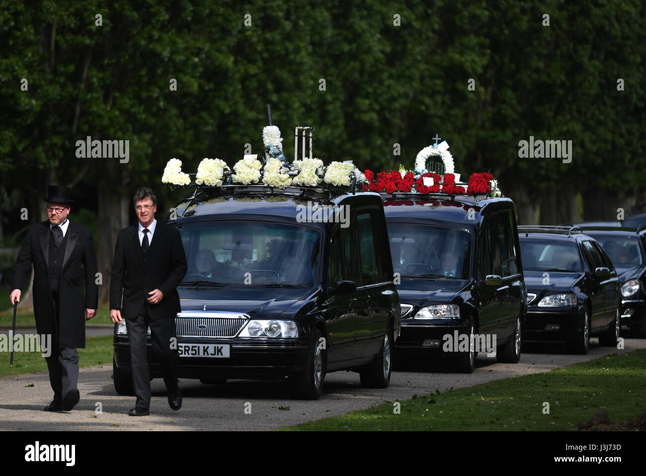 A hearse carrying the coffin of Leslie Rhodes, who died in the ...