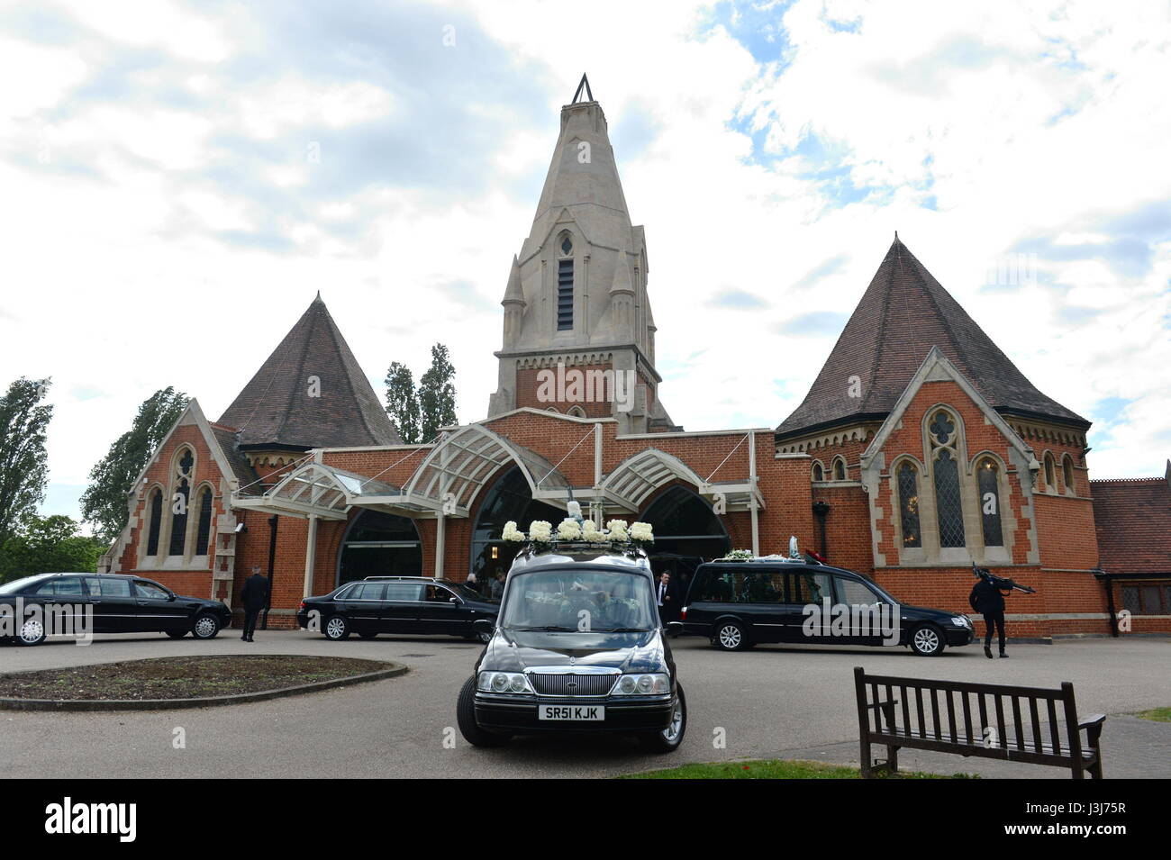A hearse carrying the coffin of Leslie Rhodes, who died in the ...