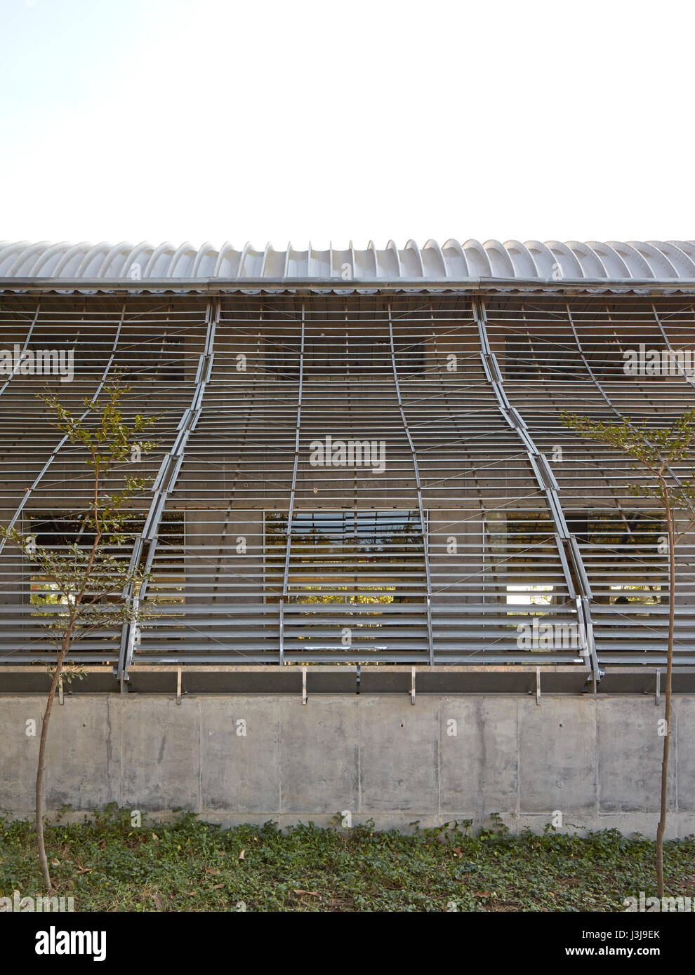 Street side exterior view showing hung steel facade. The Pool Studio of ...
