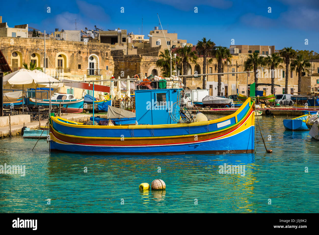 Marsaxlokk, Malta - Traditional colorful maltese Luzzu fisherboat at ...