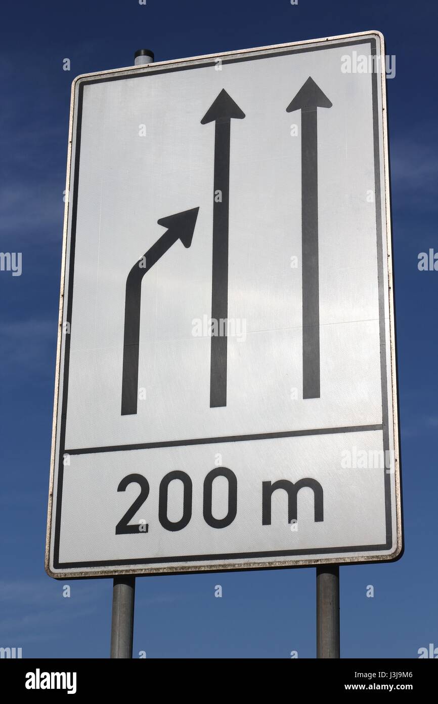 End of lane traffic sign hi-res stock photography and images - Alamy