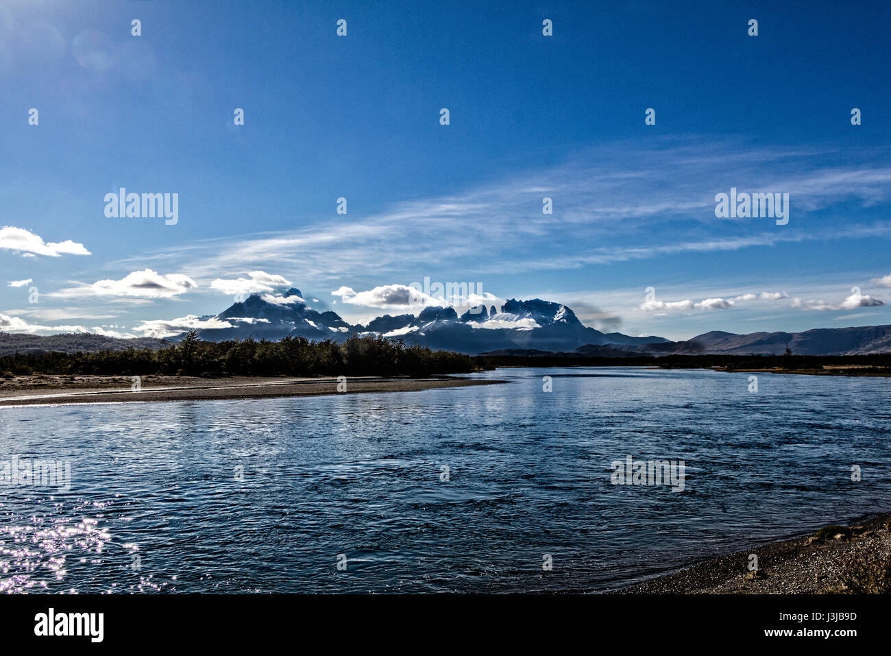 Serrano river withTorres del Paine peaks on background Stock Photo - Alamy