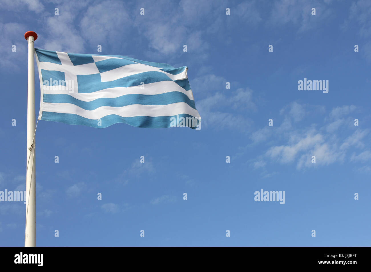 Greek flag flying in the wind Stock Photo - Alamy