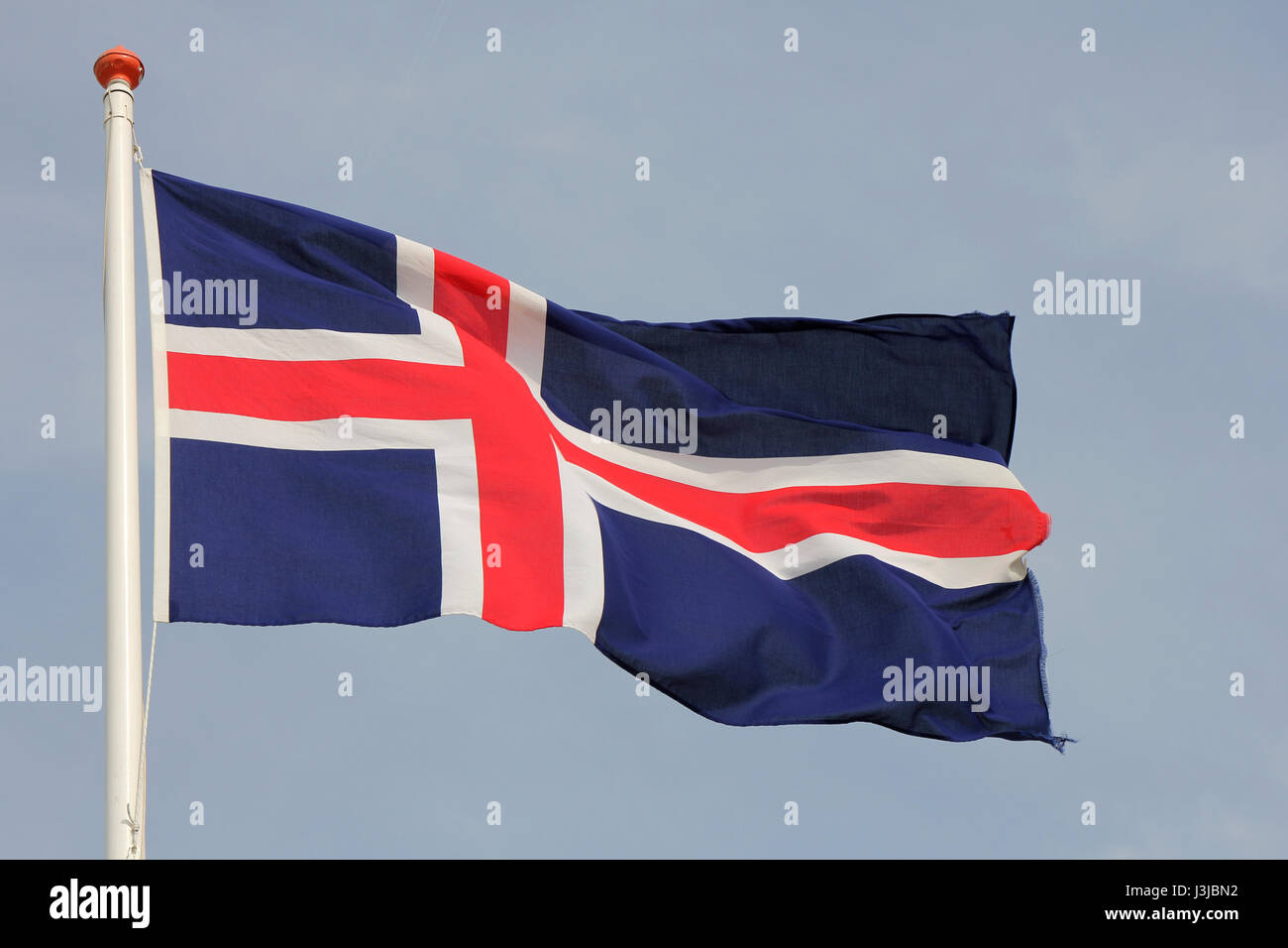 Icelandic flag flying in the wind Stock Photo - Alamy