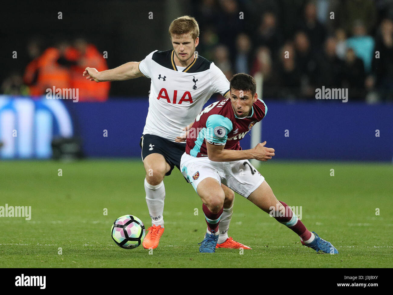 West Ham United's Jonathan Calleri and Tottenham Hotspur's Eric Dier ...