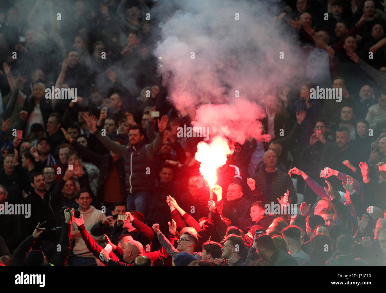 A flare in the crowd during the Premier League match at The London ...