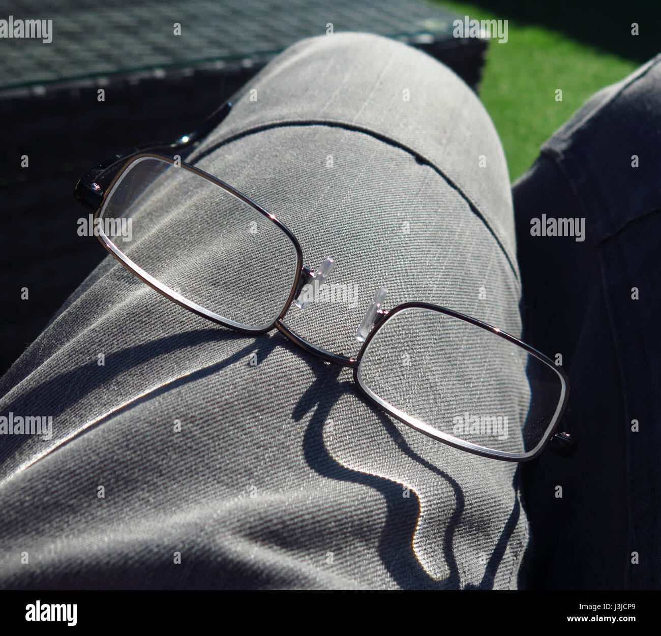 Mans glasses rest hi-res stock photography and images - Alamy