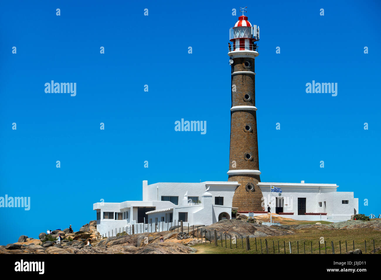 A scenic view of the lighthouse on the Atlantic coast at Cabo Polonio ...