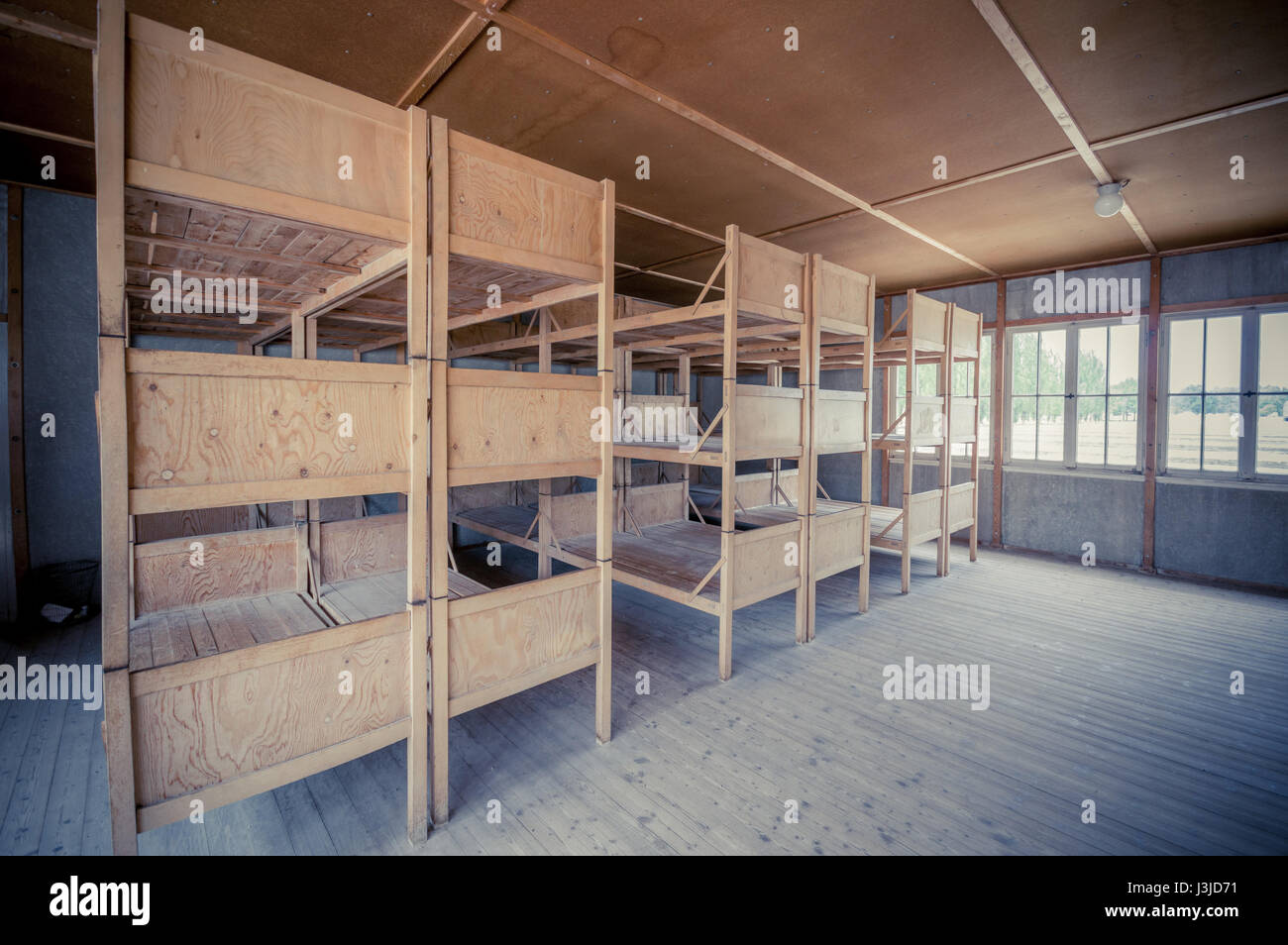 Dachau, Germany - July 30, 2015: Inside sleeping quarters with wooden ...
