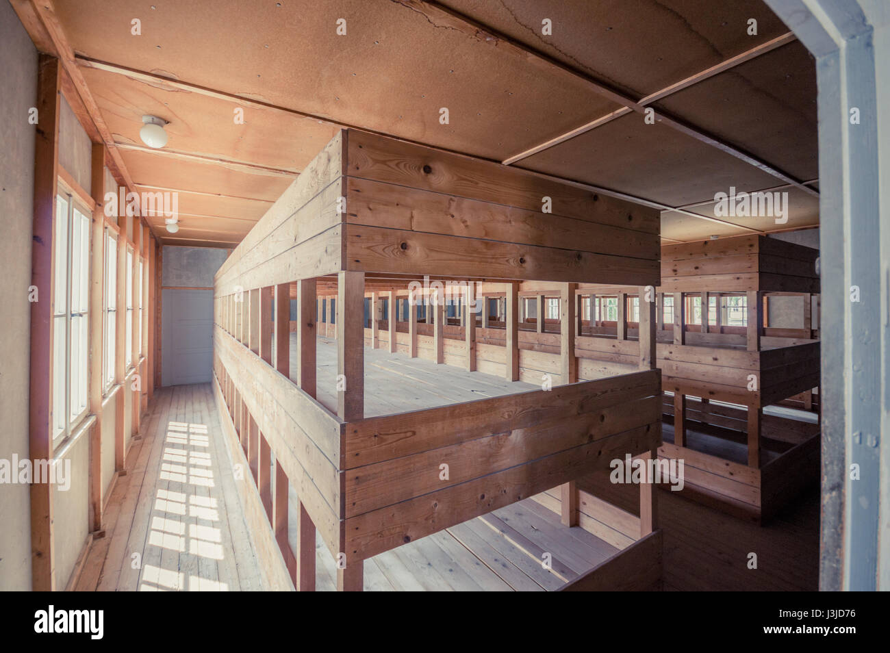 Dachau, Germany - July 30, 2015: Inside sleeping quarters with wooden ...