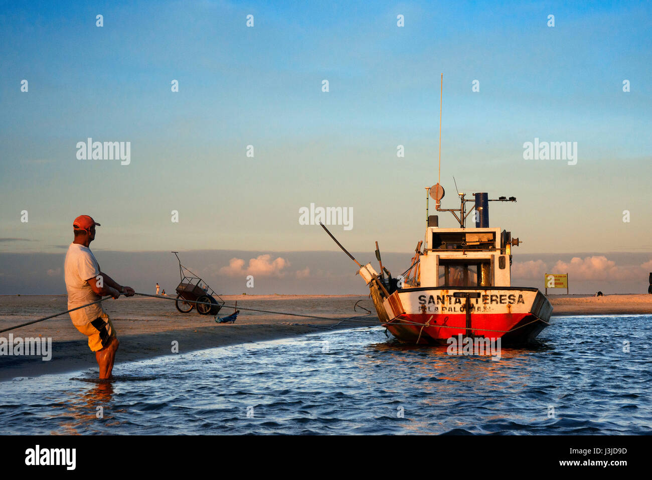 Fisherman in the beach of Barra de Valizas, Rocha Department, Uruguay ...