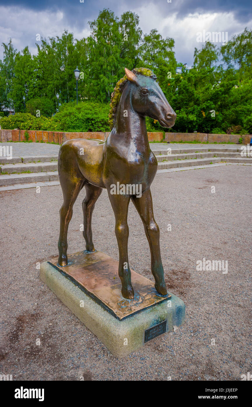 OSLO, NORWAY - 8 JULY, 2015: Statue of a young horse with scared body ...