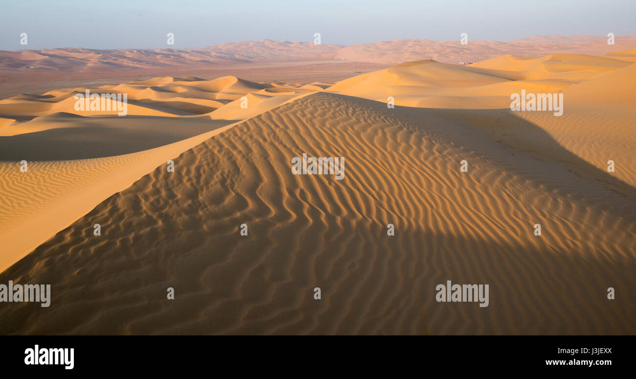 Liwa Oasis, Abu Dhabi , United Arab Emirates -, sunlight over rippling ...