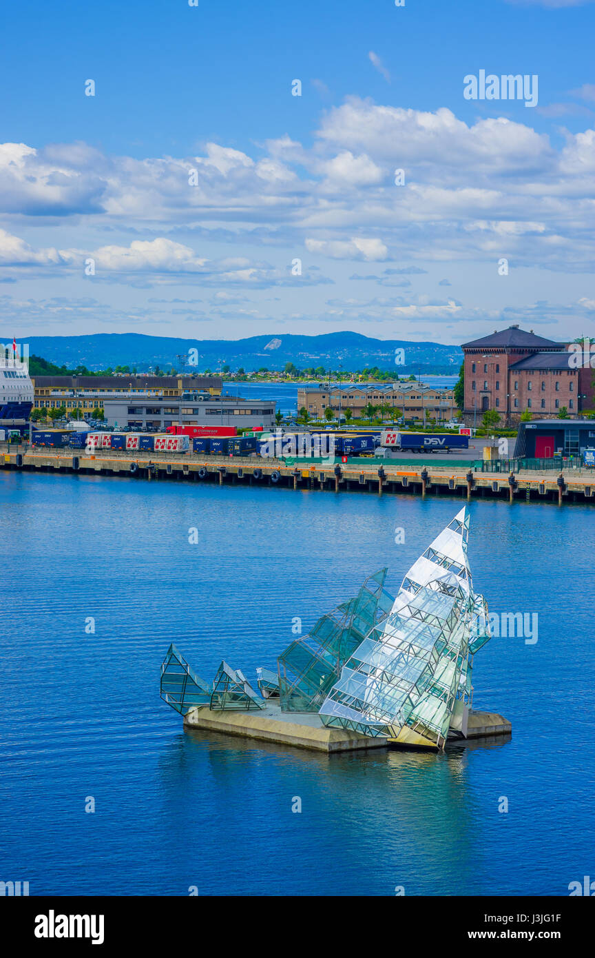 OSLO, NORWAY - 8 JULY, 2015: Triangular art installation in water ...