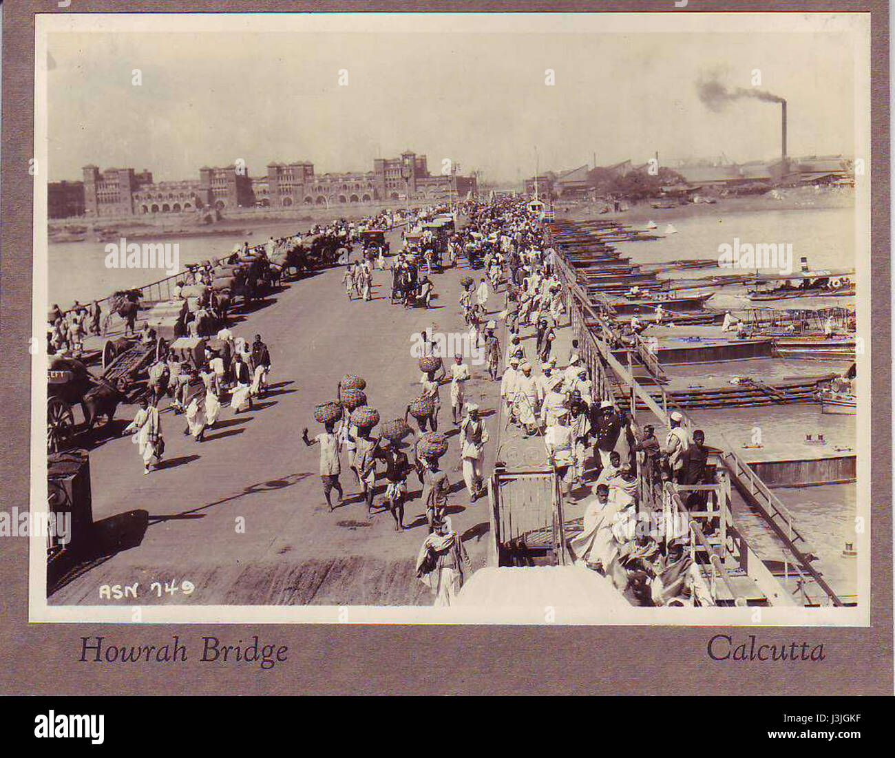 The Howrah Bridge in Calcutta, photographed in the 1920s, is a vital ...