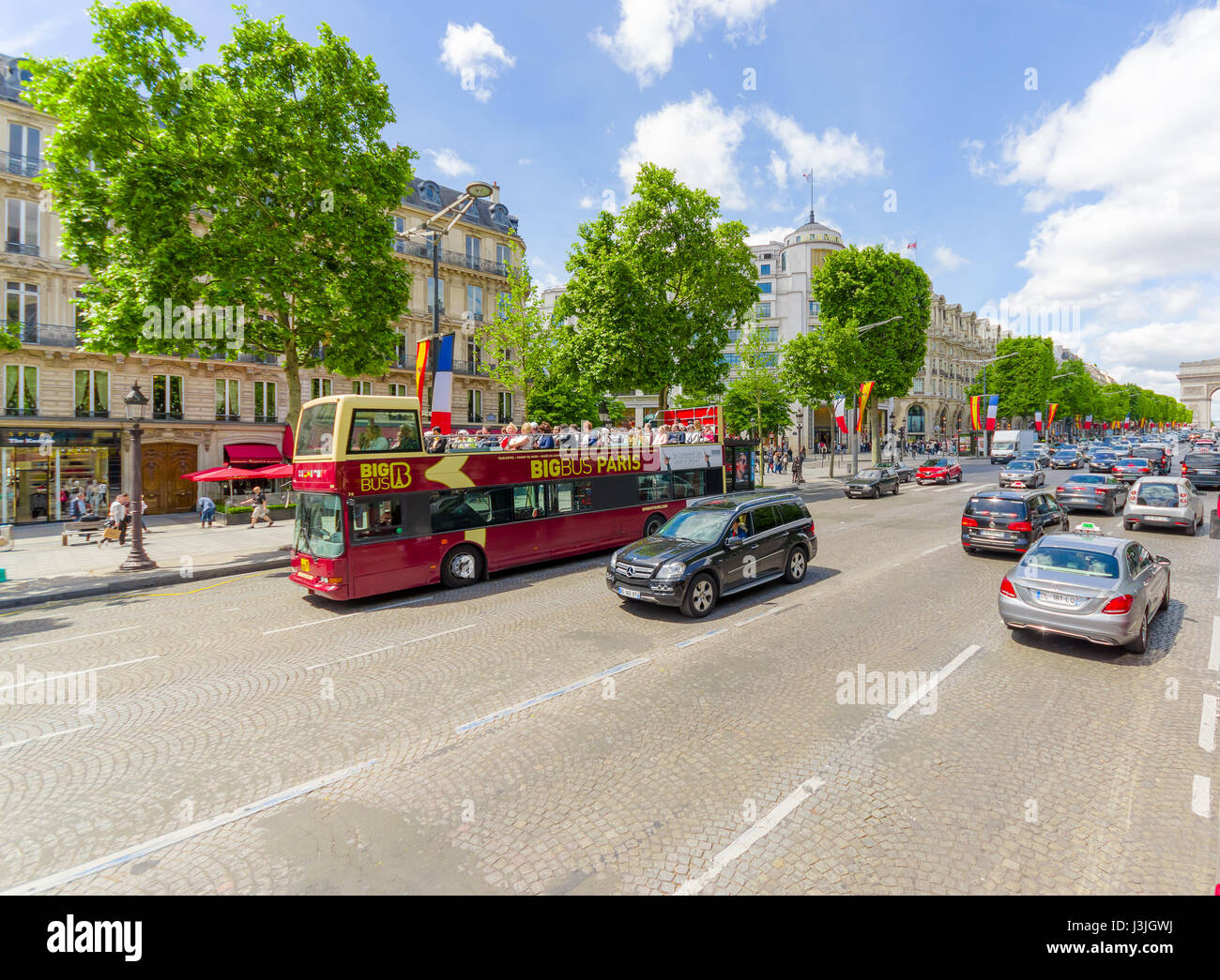 Paris, France - June 1, 2015: Great view from city tour bus driving ...