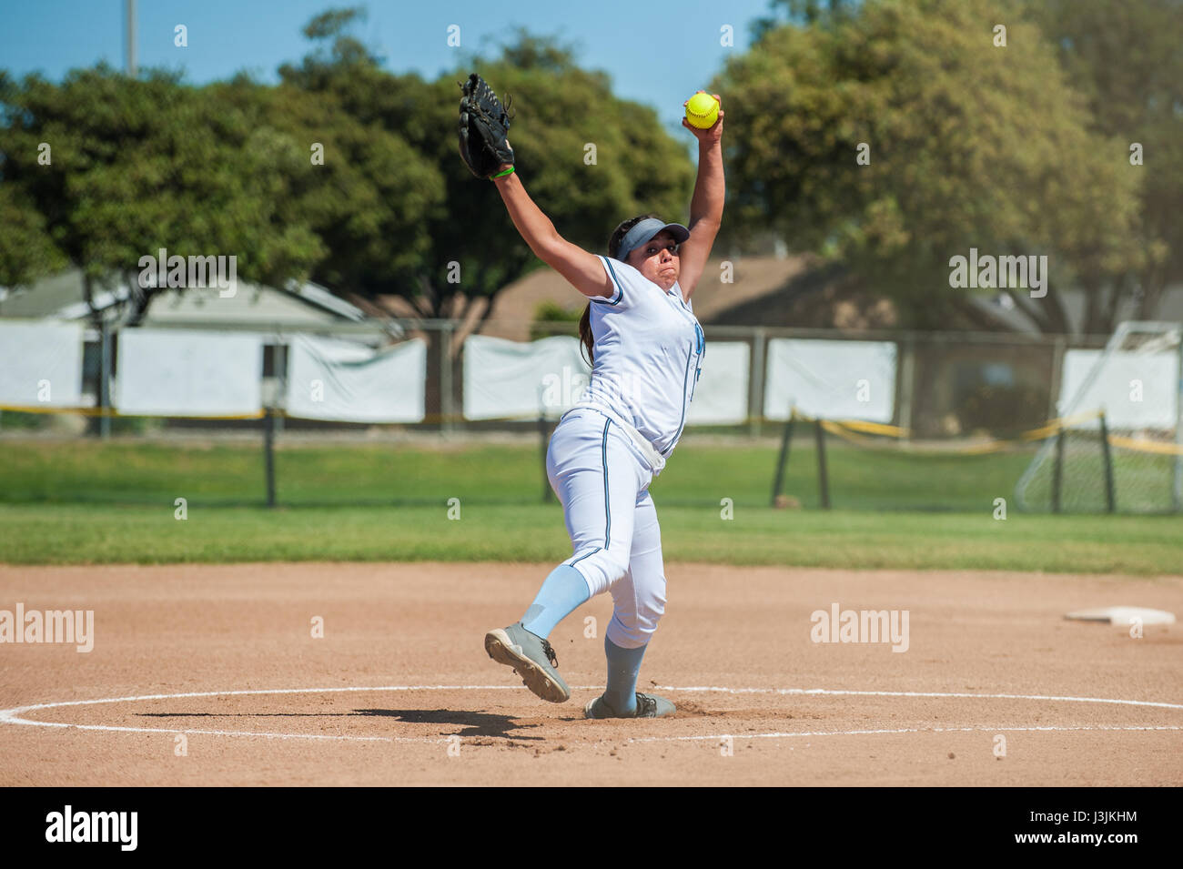 Softball Players Throwing