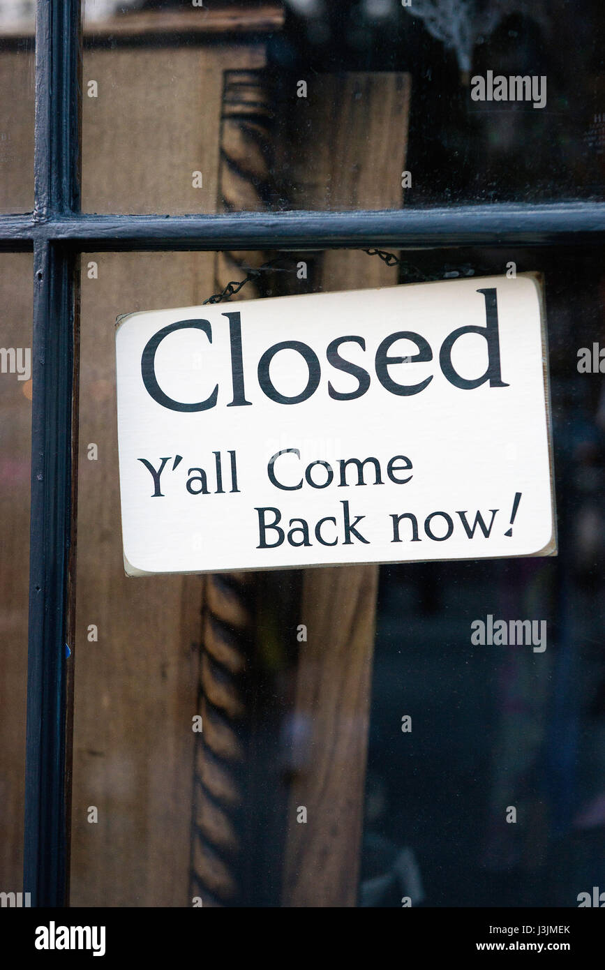 Hanging signage hi-res stock photography and images - Alamy