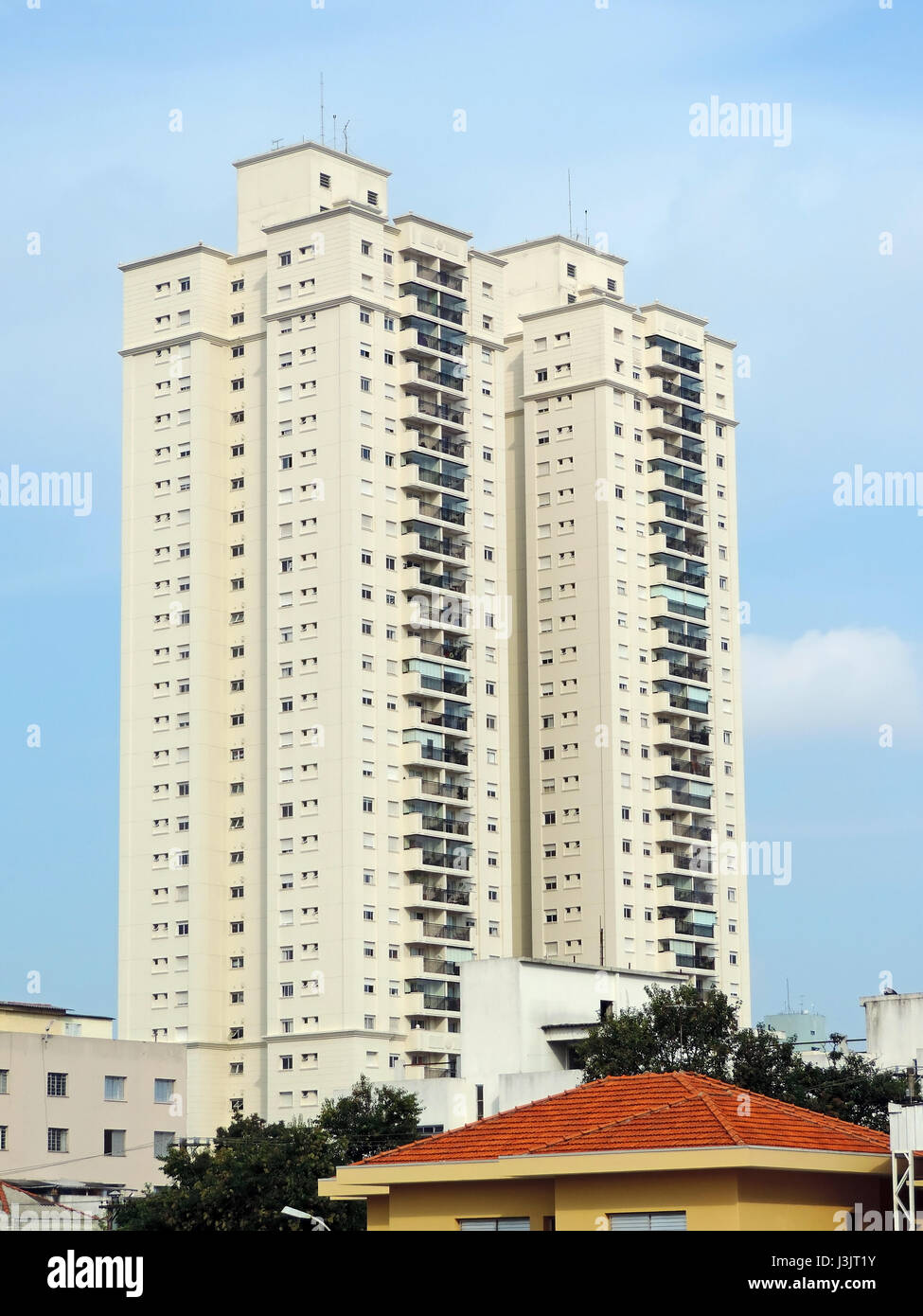 Two tall residential buildings in the cityscape Stock Photo - Alamy