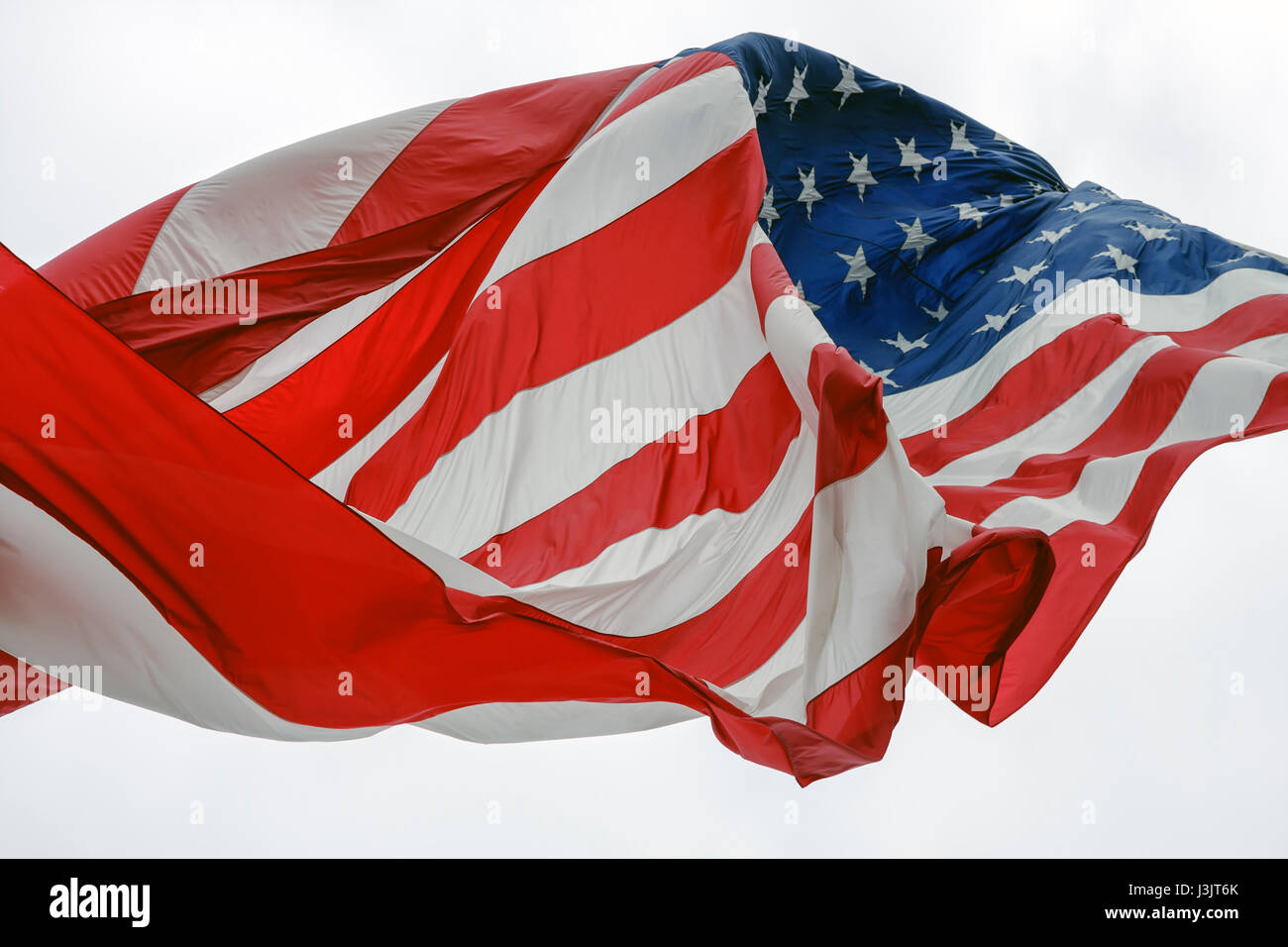 Miami Florida,Flagler Street,flag,flapping,folds,stars,stripes,red,blue ...