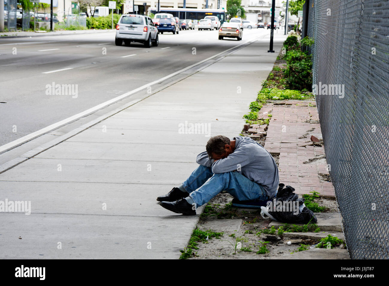 Miami Florida,downtown,homeless man,sitting,street,sidewalk,poverty ...